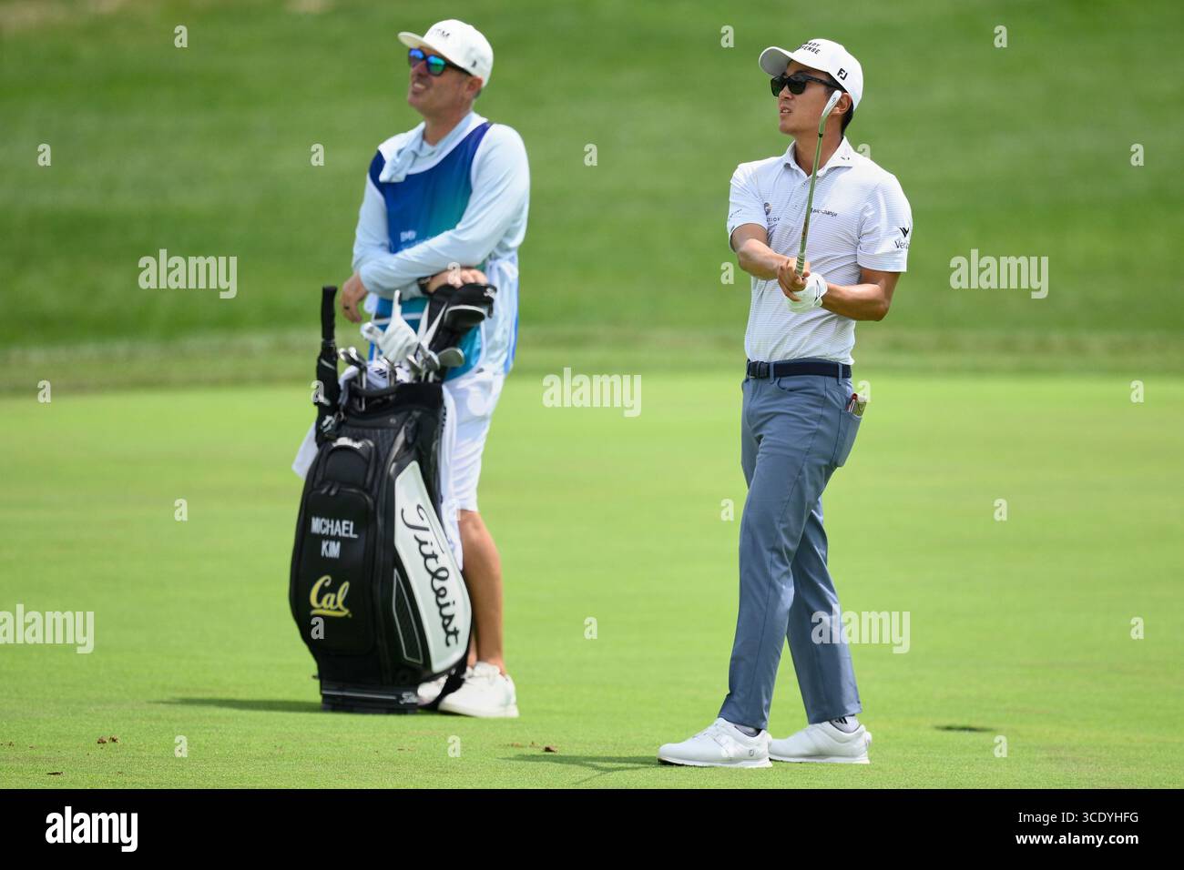 Michael Kim hits on the 18th hole during the first round of the BMW ...