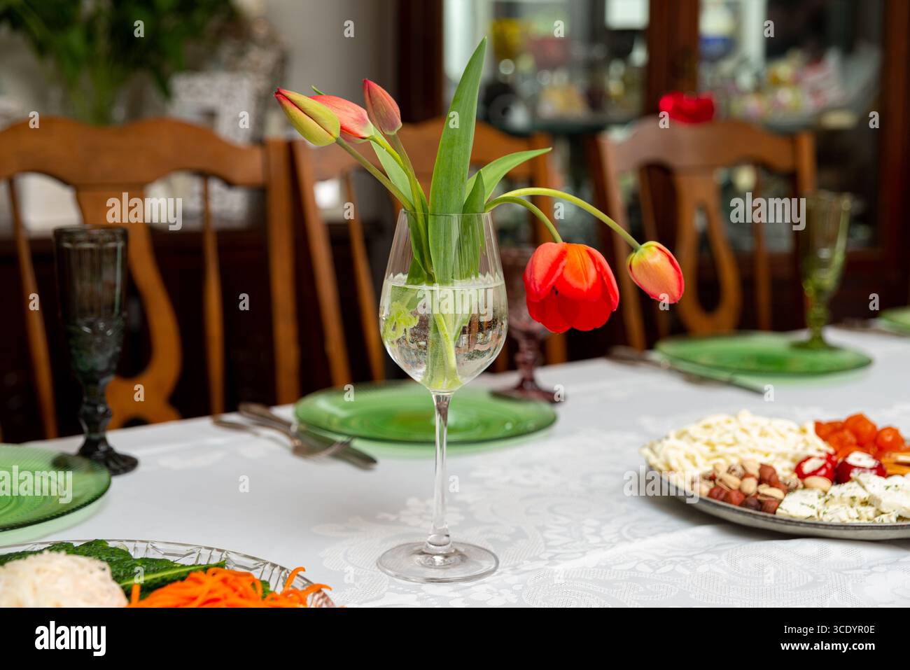 Beautifully arranged table setting features hi-res stock photography ...