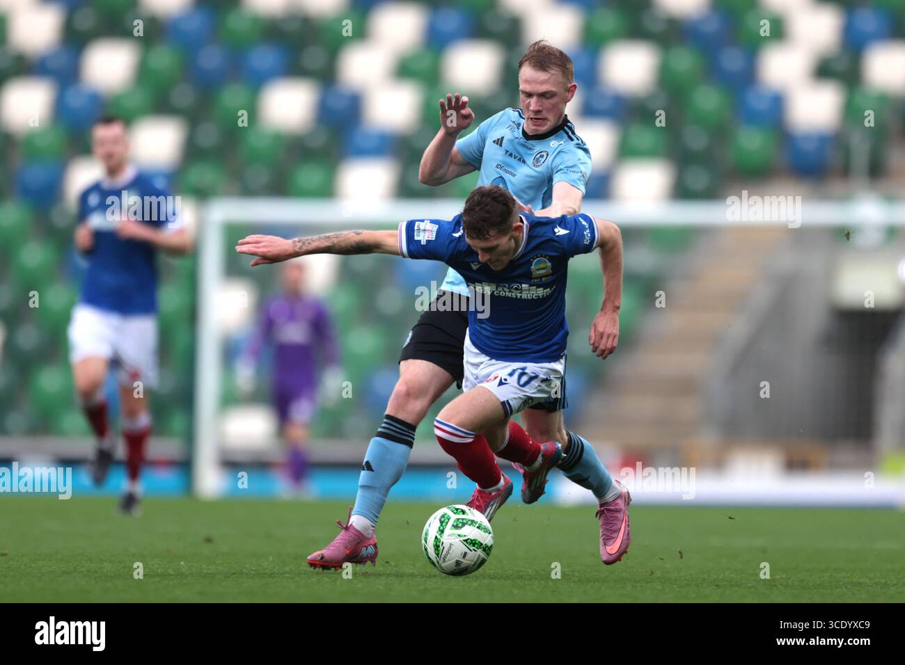 Vikingur's Ari Olsen (left) and Linfield's Charlie Allen battle for the ...