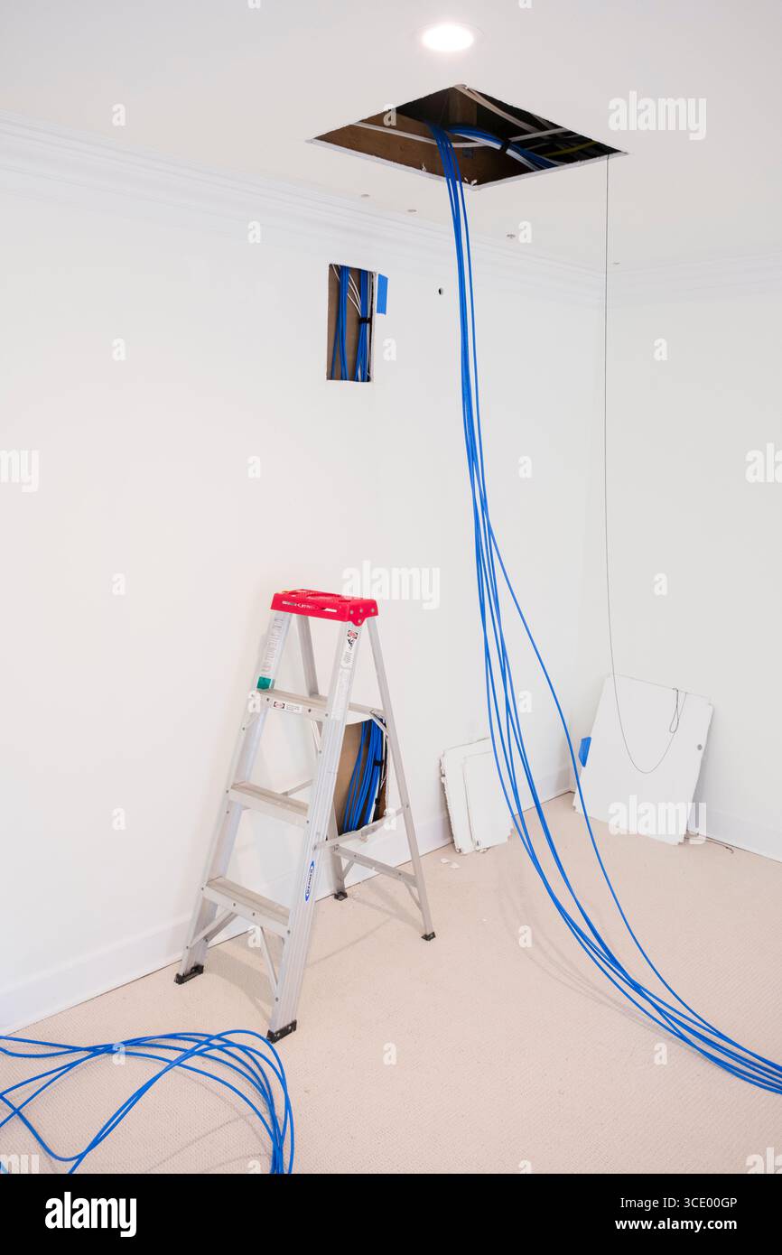 5 foot ladder used in installation of Cat-6A ethernet cables for a ...