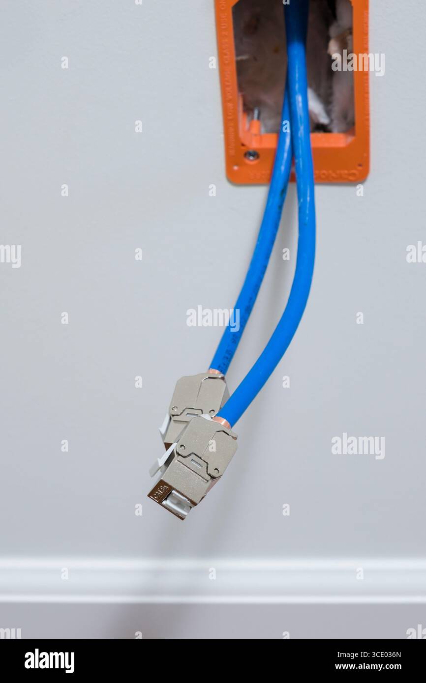 Ethernet Cat-6a cable terminated in 180 keystone shield jack coming out ...