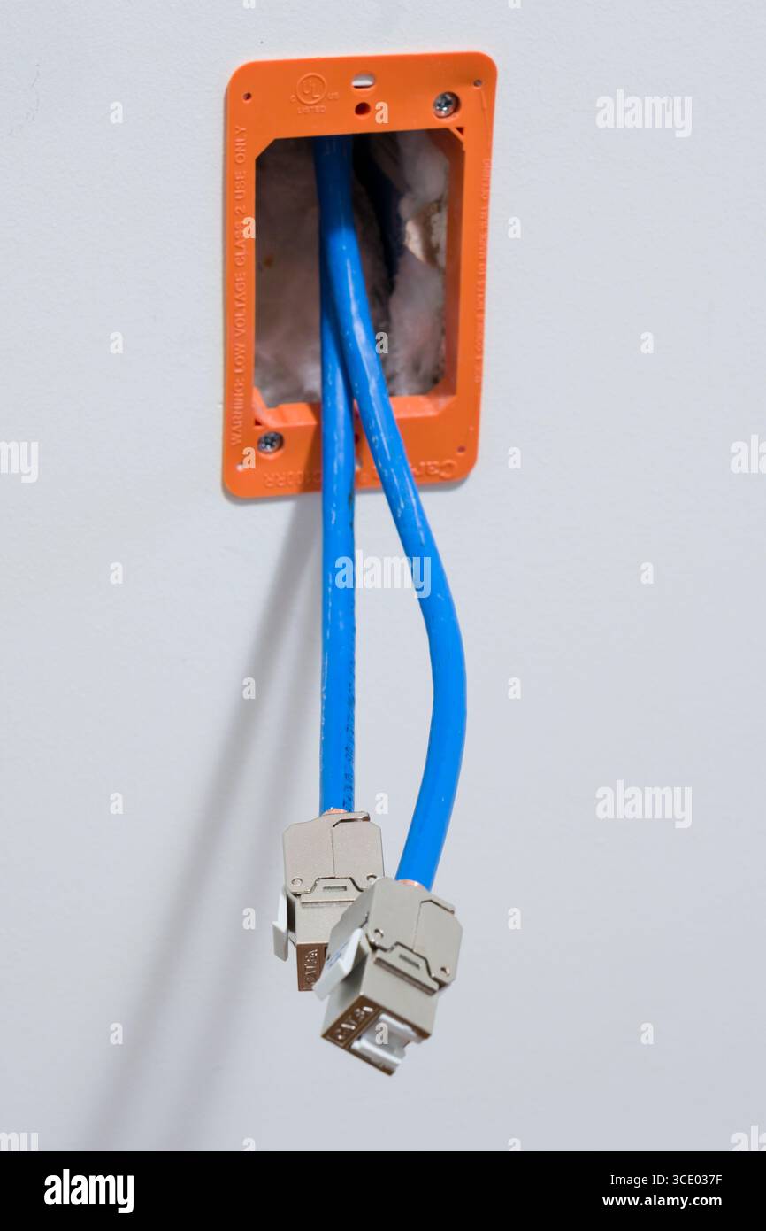 Ethernet Cat-6a cable terminated in 180 keystone shield jack coming out ...