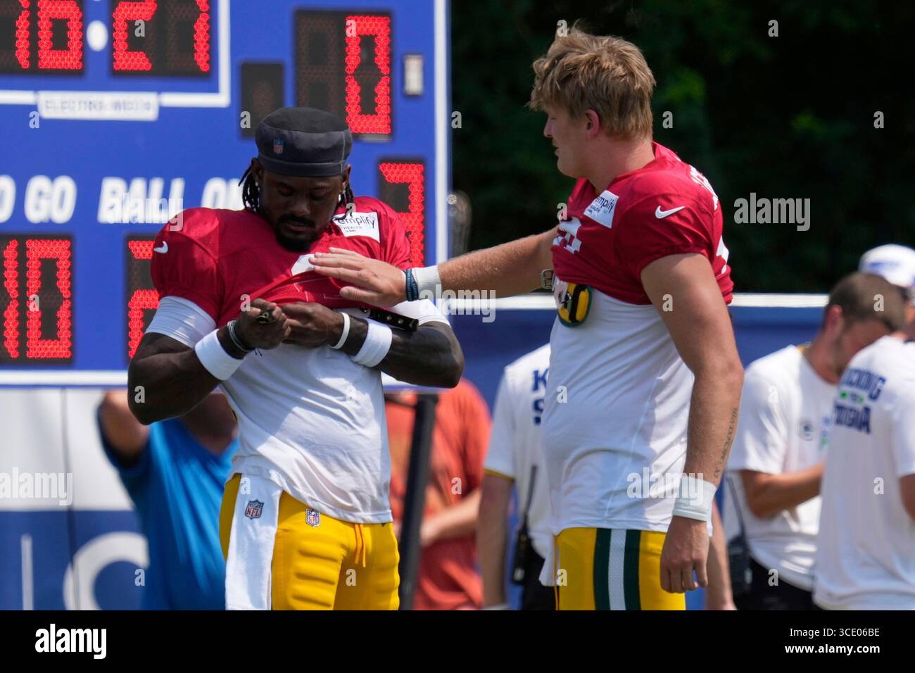 Green Bay Packers quarterback Malik Willis, left and quarterback Taylor ...