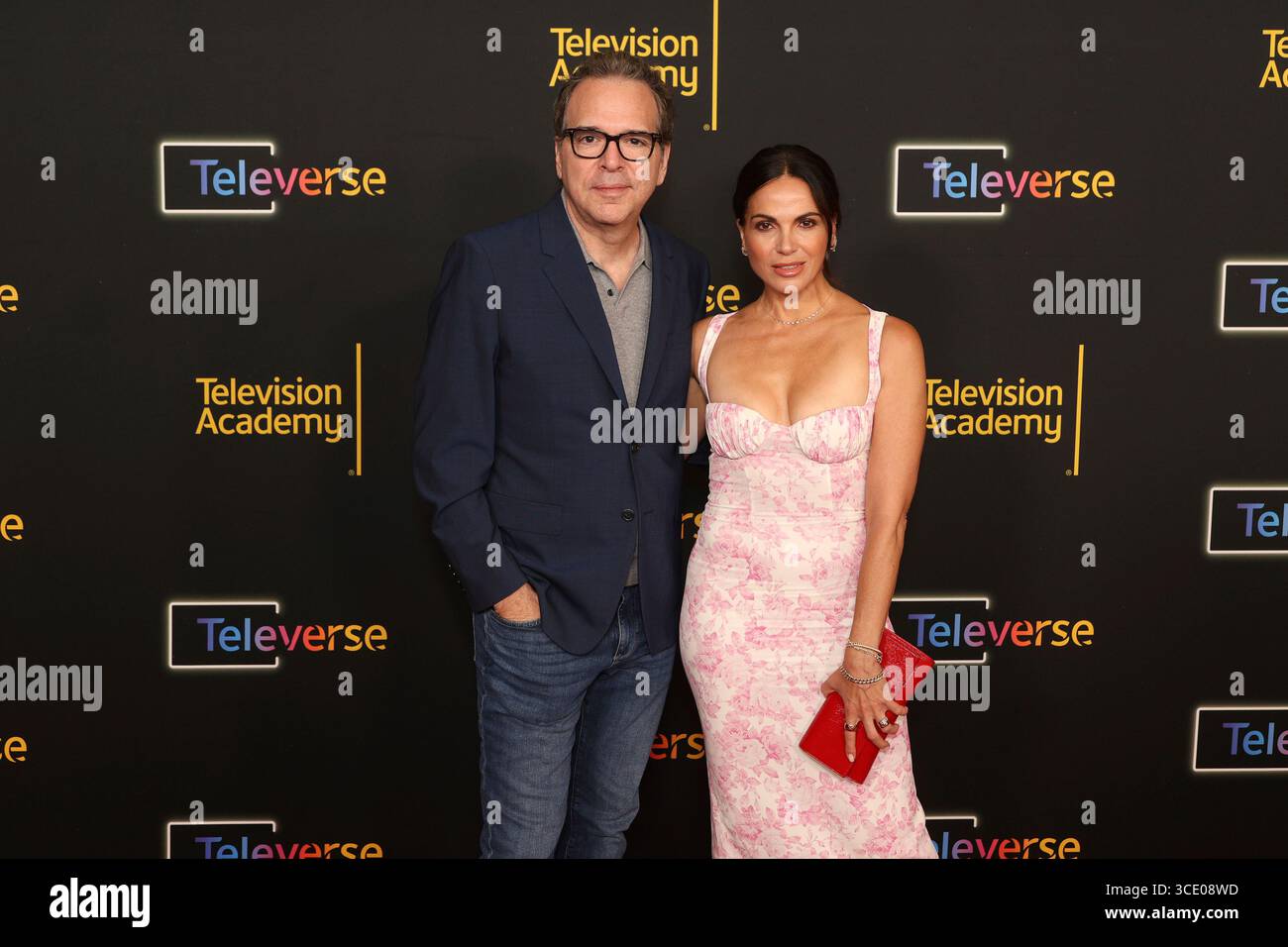 Michael Seitzman, on left, and Lana Parilla walk the red carpet at ...