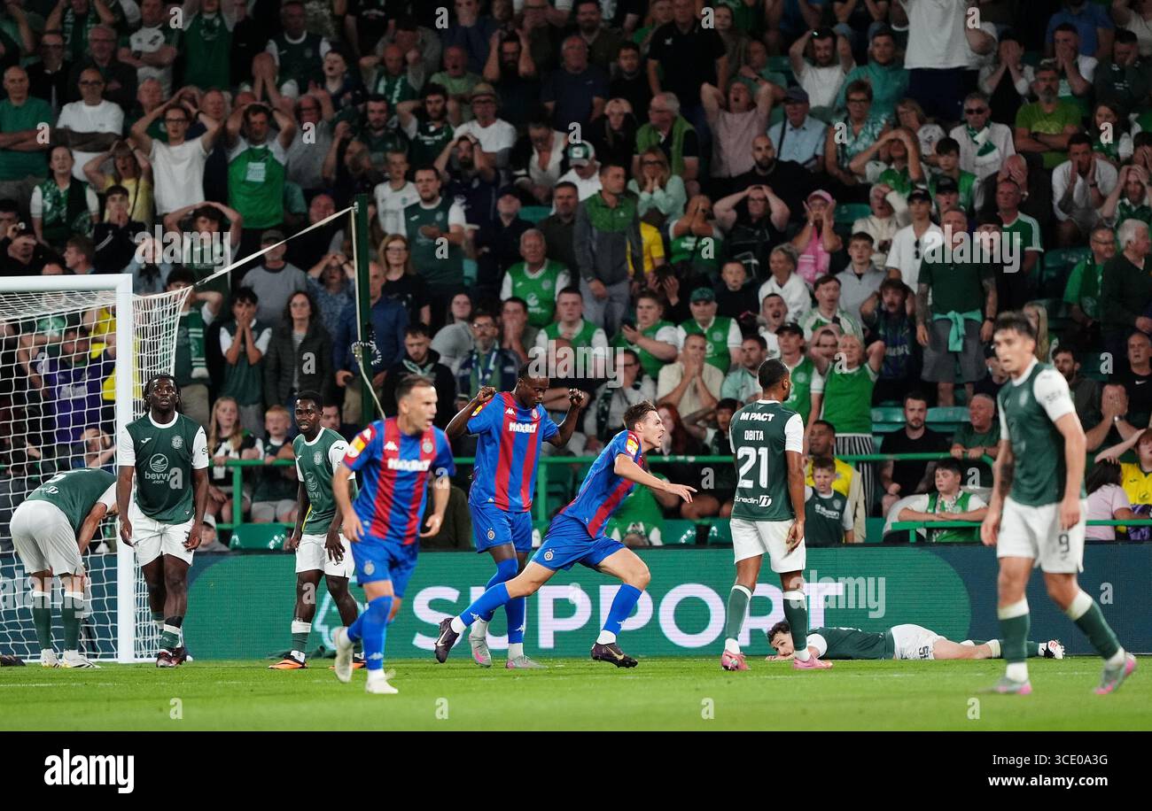 Partizan's Andrej Kostic celebrates scoring their side's third goal ...