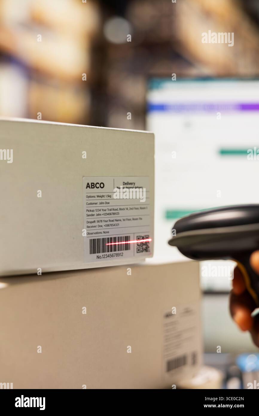 Black female staff scanning shipping hi-res stock photography and ...