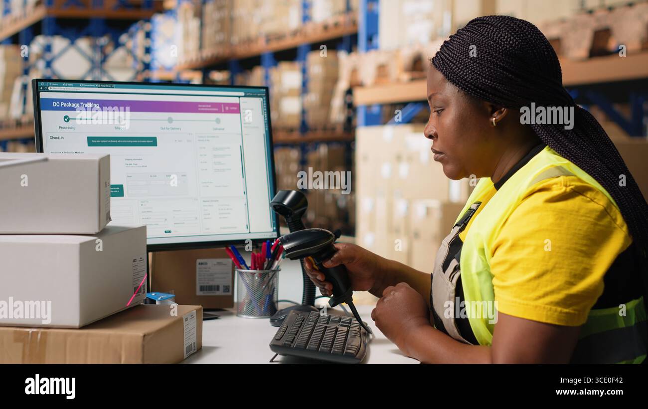 Black employee scanning awb hi-res stock photography and images - Alamy