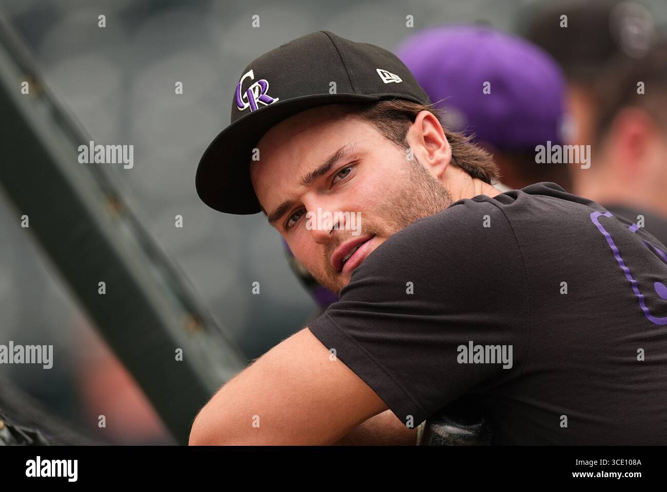 Colorado Rockies third baseman Kyle Karros warms up before a baseball ...