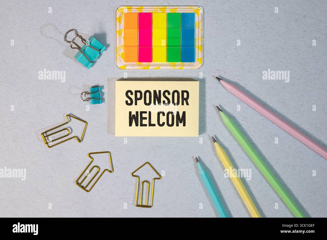 Business man pointing the text: Sponsors Welcome Stock Photo - Alamy