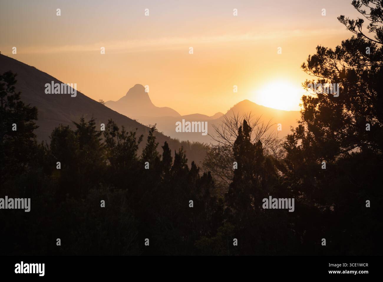 Golden Horizon behind Mountain Peaks in Itaipava, Brazil Stock Photo ...