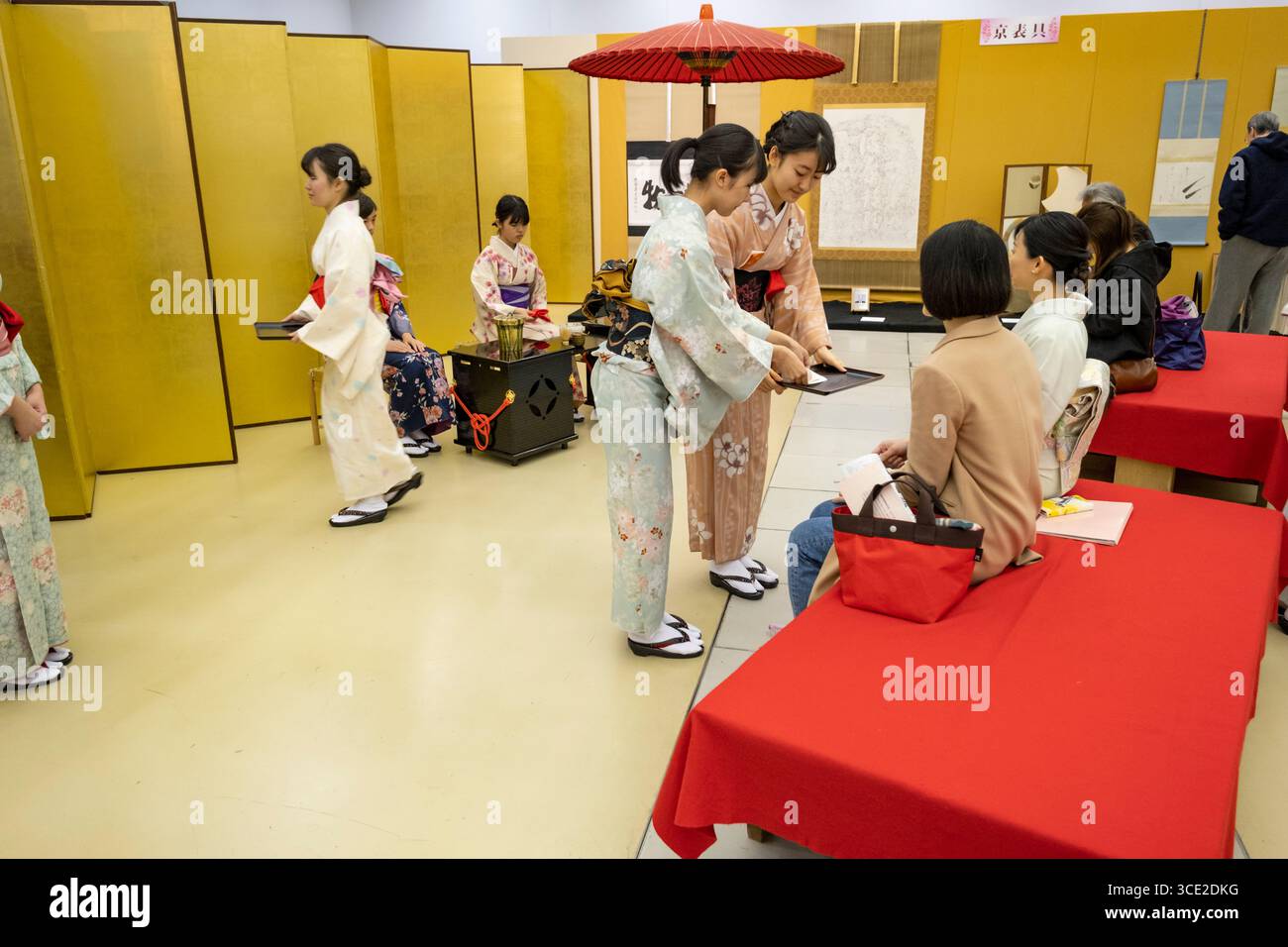 Female high school students dressing in traditional Japanese kimonos ...