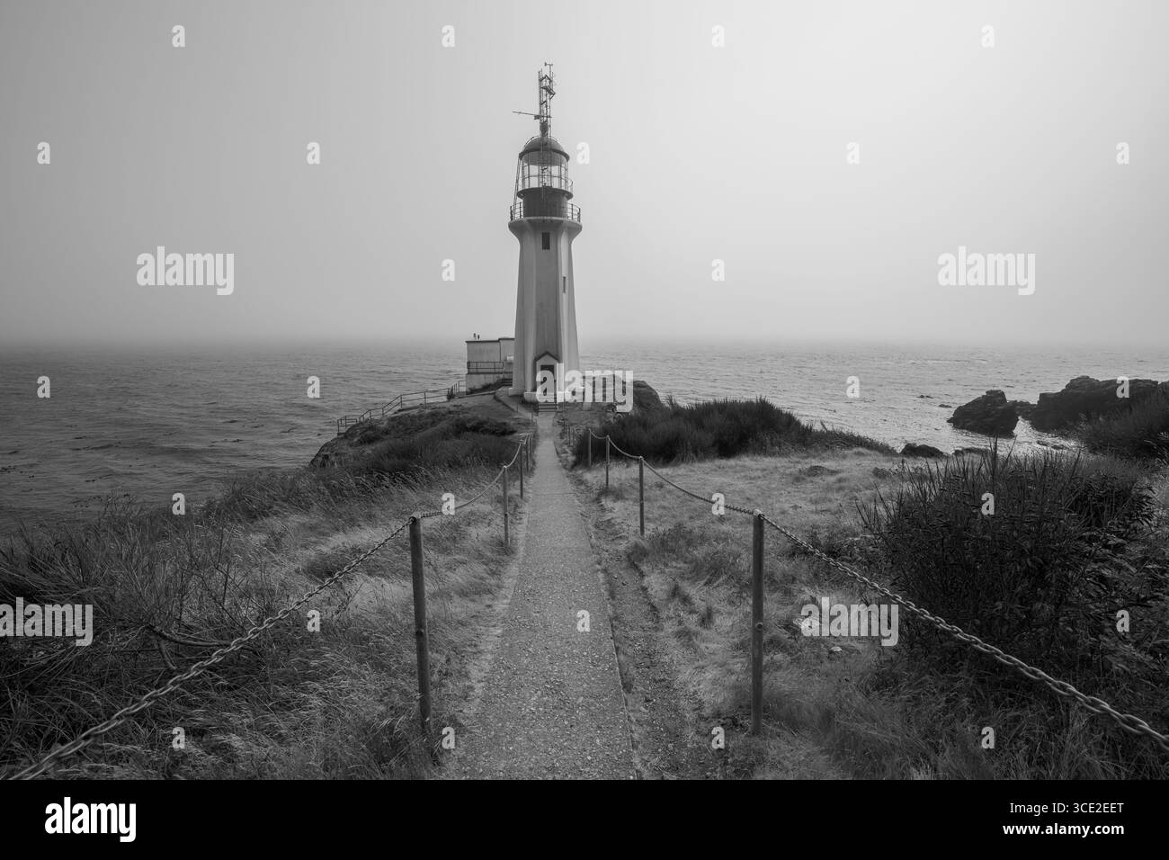 Sheringham Point Lighthouse in the fog in Shirley, BC, Canada Stock ...