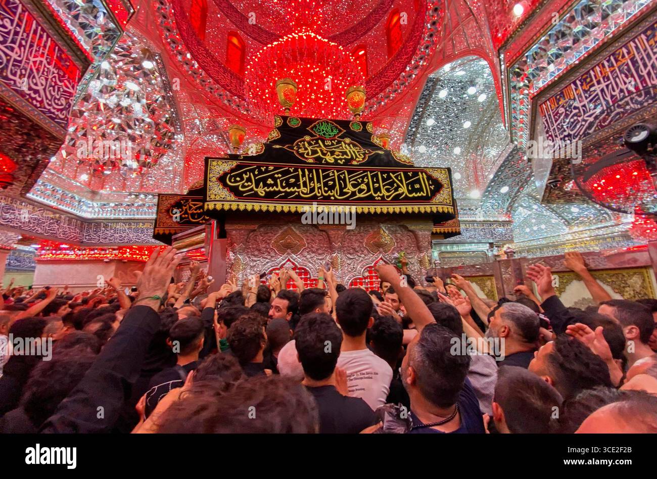 Shiite pilgrims mark the holiday of Arbaeen inside the holy shrine of ...