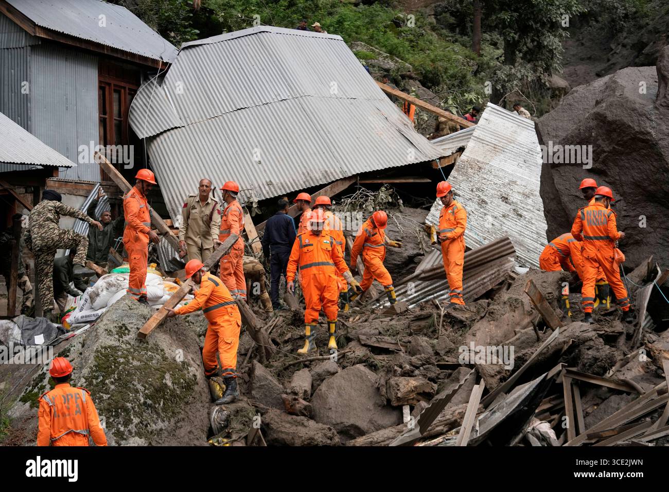 India's National Disaster Response Force (NDRF) personnel carry out a ...