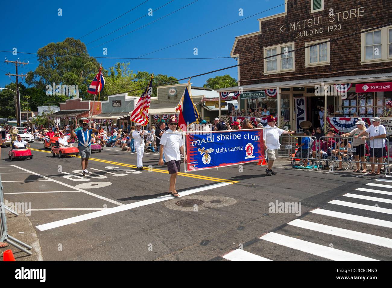 Men carrying banner for the Maui Shrine Club during the 54th annual ...