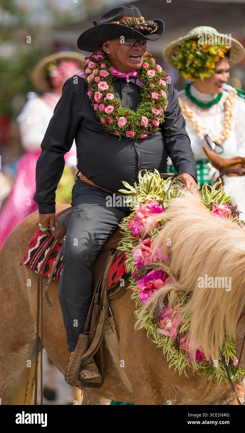 Hawaiian cowboy on horseback riding up Baldwin Avenue during the 54th ...