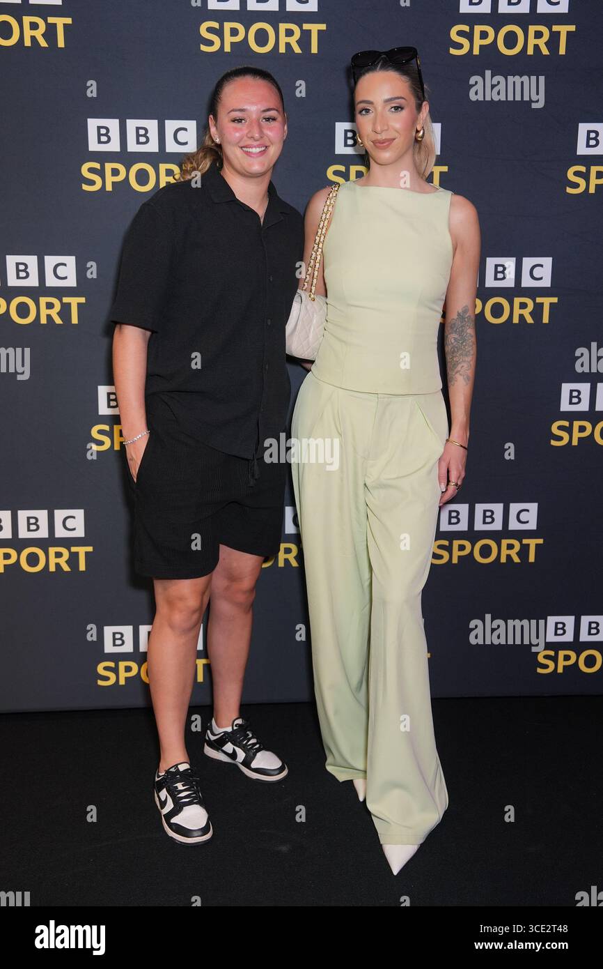 GK Barry (right) and her girlfriend Ella Rutherford at BBC Sport's 2025 ...