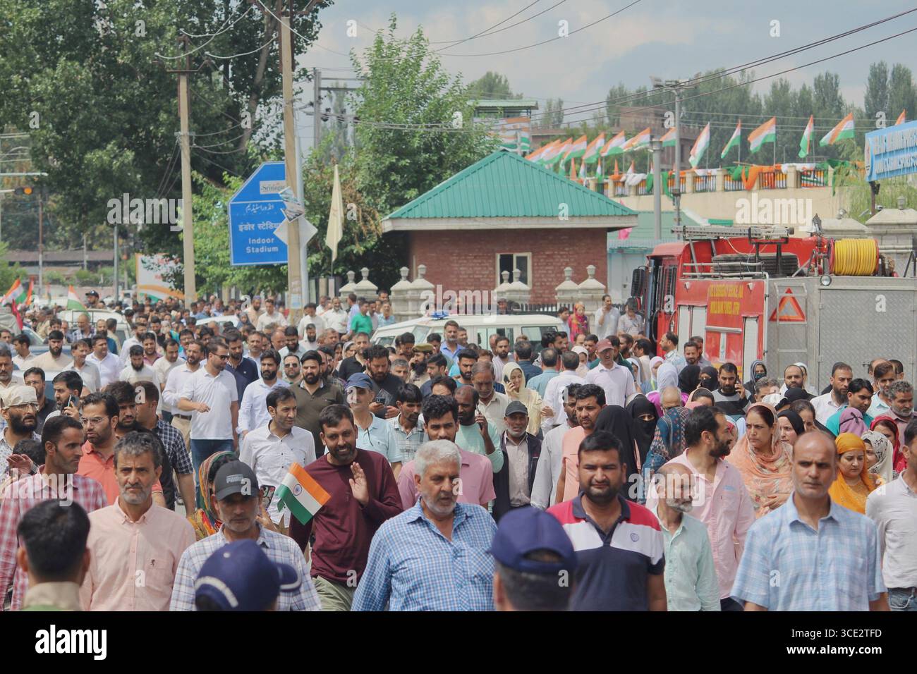 Crowds make their way out of Bakshi Stadium in Srinagar after attending ...
