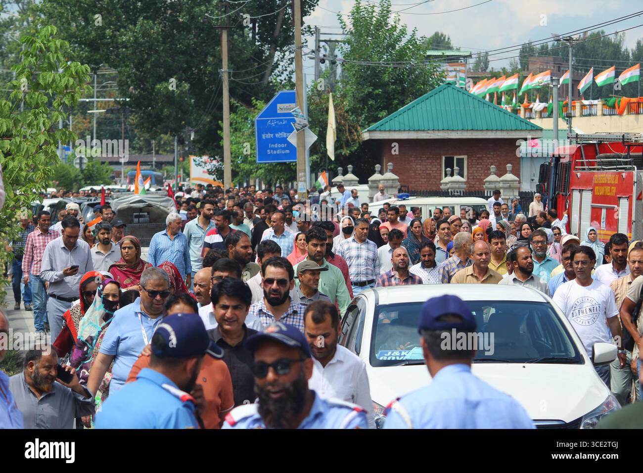 Crowds make their way out of Bakshi Stadium in Srinagar after attending ...