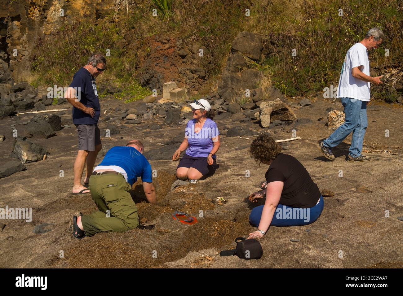 People collecting beach glass at Glass Beach, once a dump Glass Beach ...