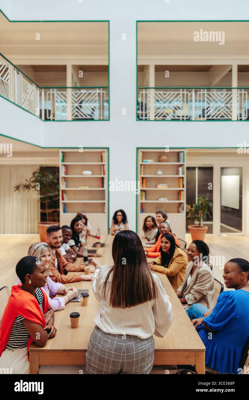 Diverse group coworkers engage hi-res stock photography and images - Alamy