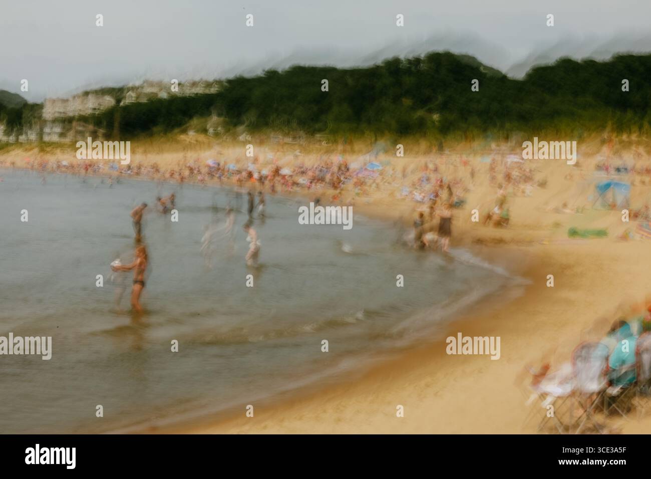 Busy beach scene hi-res stock photography and images - Alamy