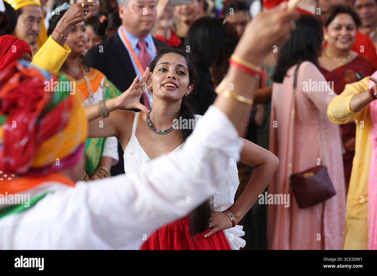 Dancers parade while performing their dances at the India National Day ...