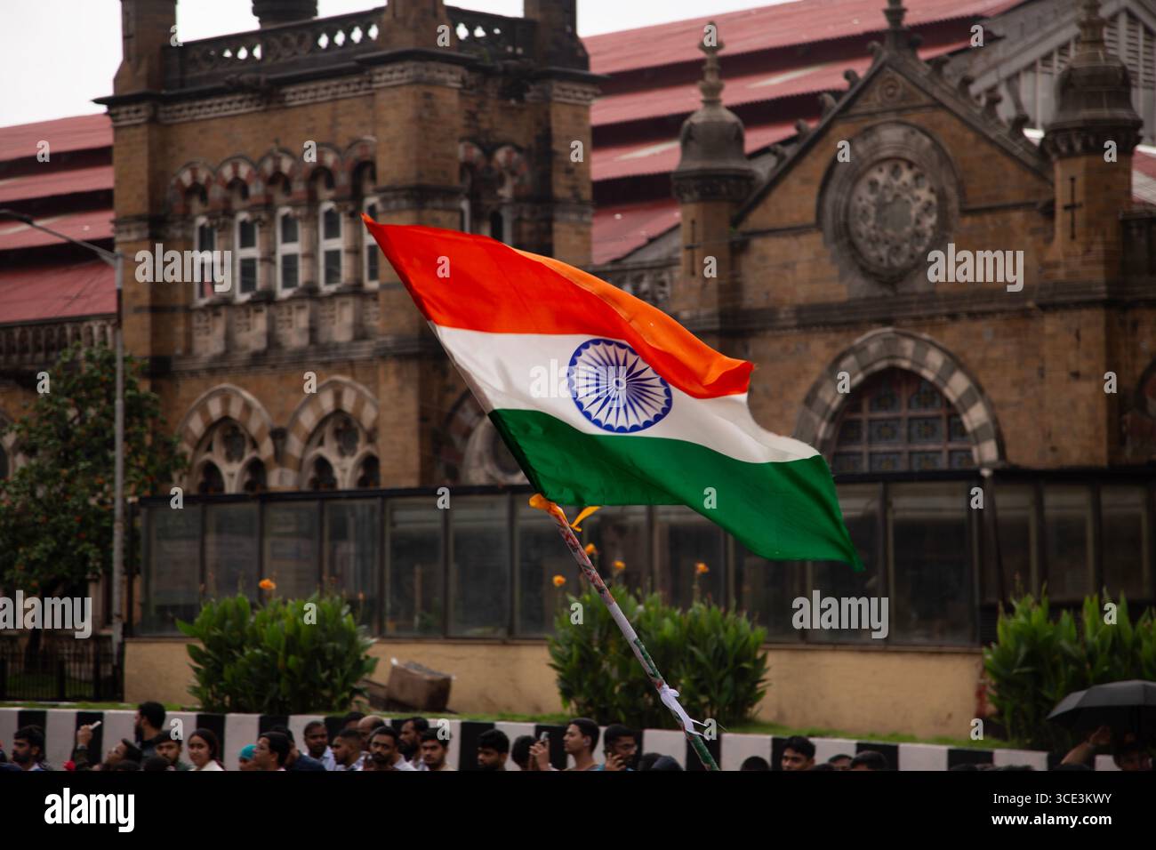 Indian tricolor flag waving proudly in front of a historic colonial-era ...