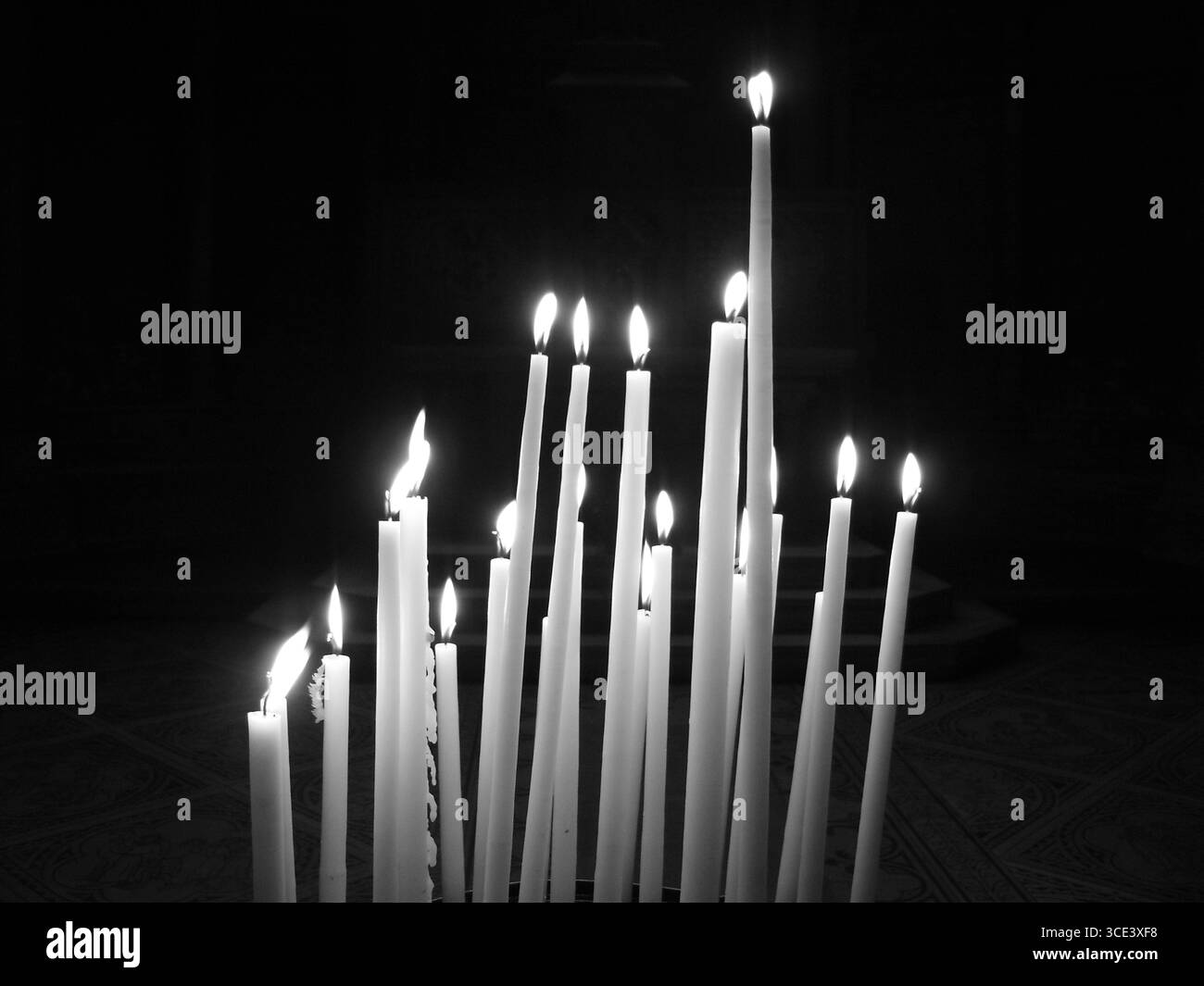 Church candles burning candles Black and White Stock Photos & Images ...