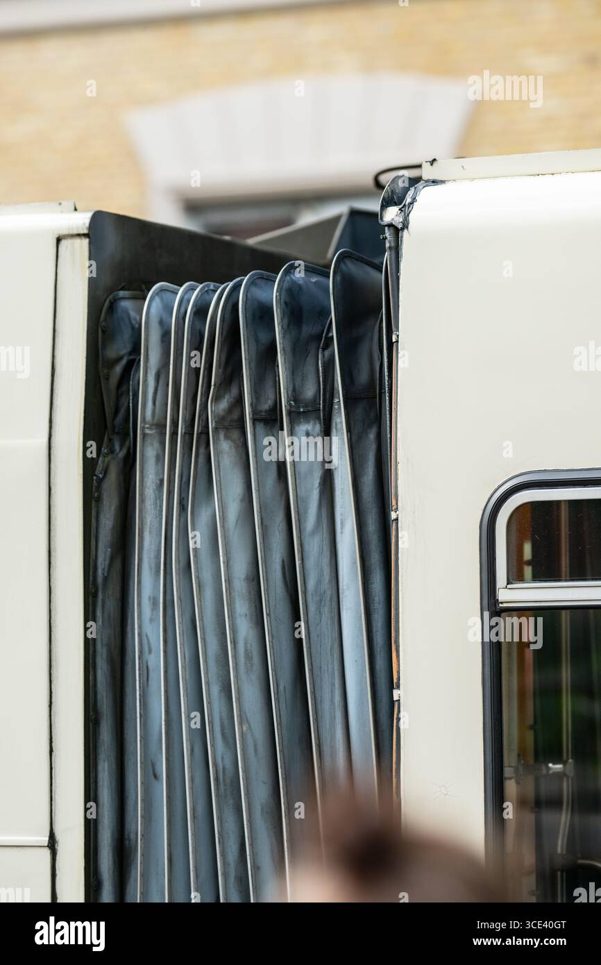 close-up of accordion joint on articulated bus Stock Photo - Alamy