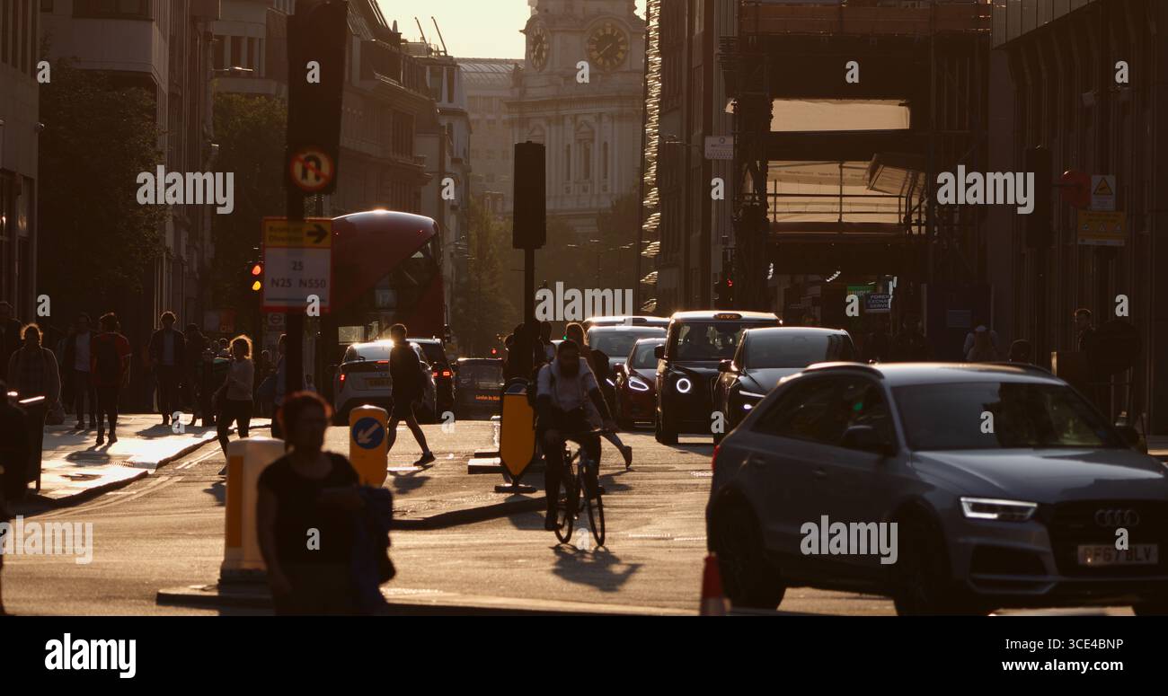 LONDON, UK - AUGUST 5, 2025 - Busy street scene in London at sunset ...