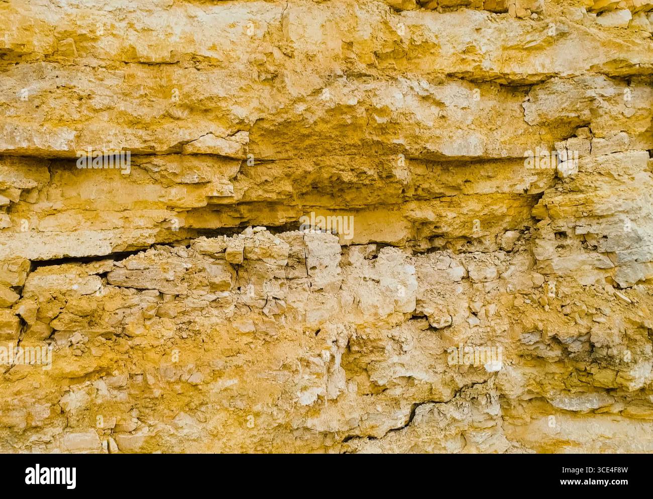 Dolomite layer on a section of soil in a quarry Stock Photo - Alamy