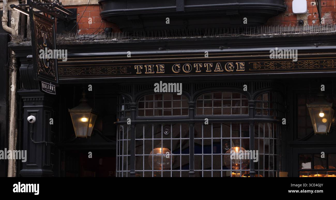 CARDIFF, UK - AUGUST 8, 2025 - Traditional english pub The Cottage in ...