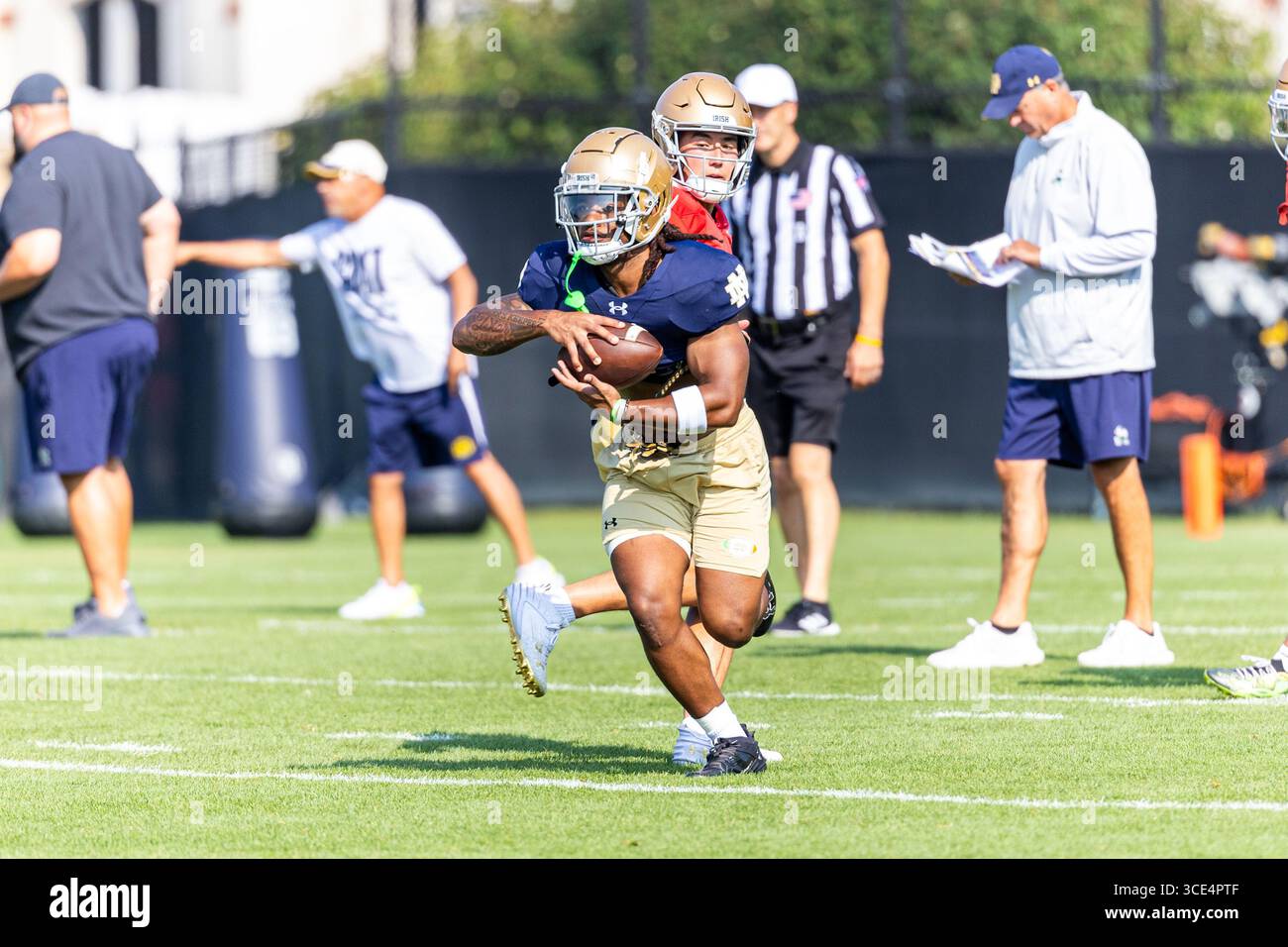 August 15, 2025: Notre Dame quarterback Tyler Buchner (10) hands the ...