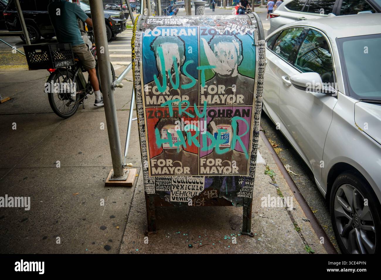 A damaged poster for Zohran Mamdani, a New York mayoral candidate, on a ...