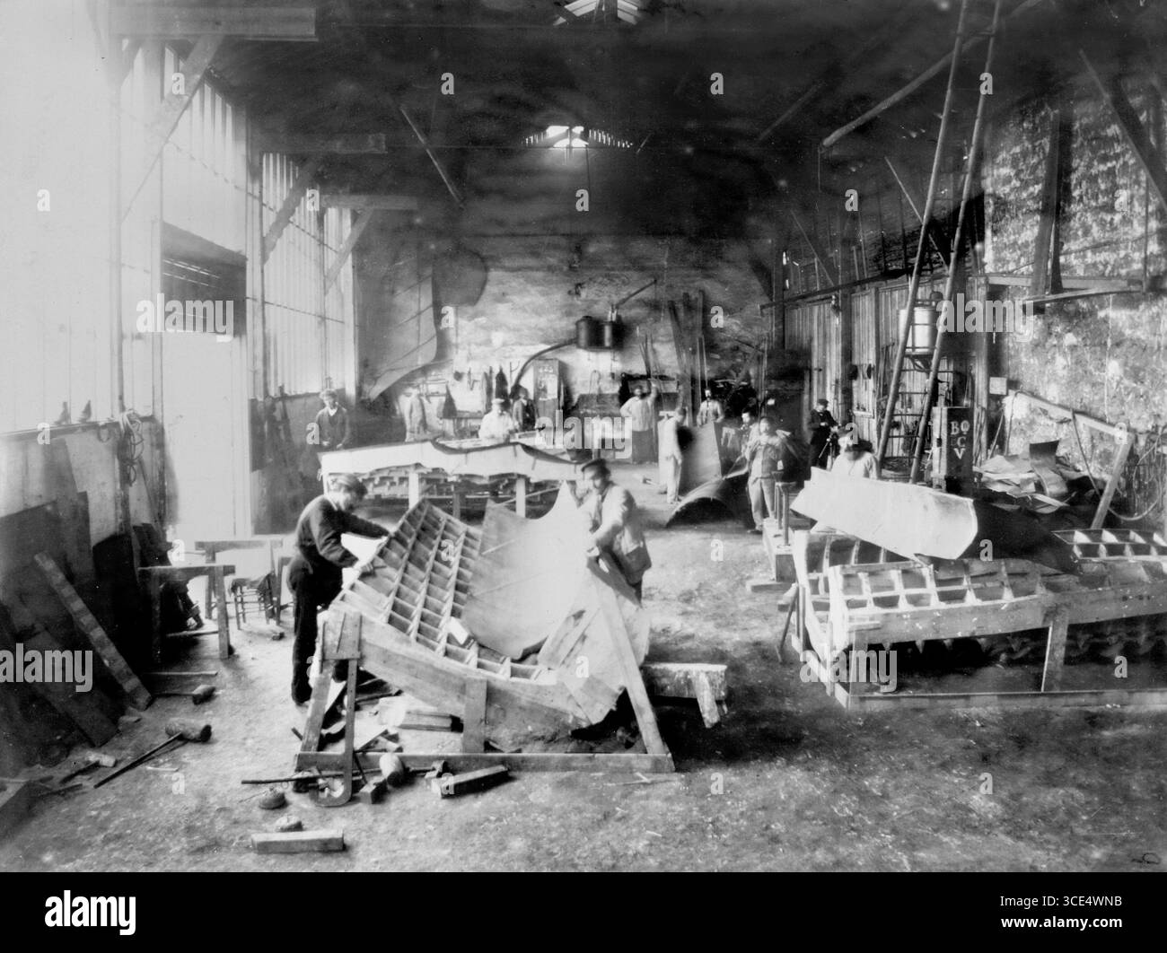 Statue of Liberty. Men in a workshop shaping sheets of copper for the ...
