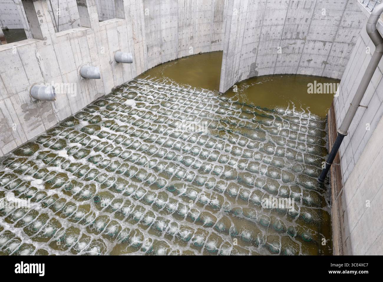 Biological treatment process in aeration basin closeup. Specialized ...