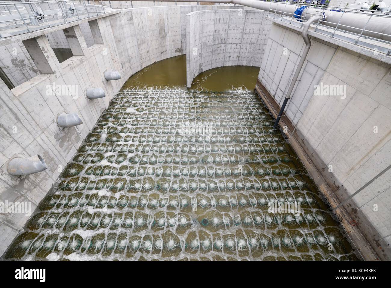 Biological treatment process in aeration basin closeup. Specialized ...