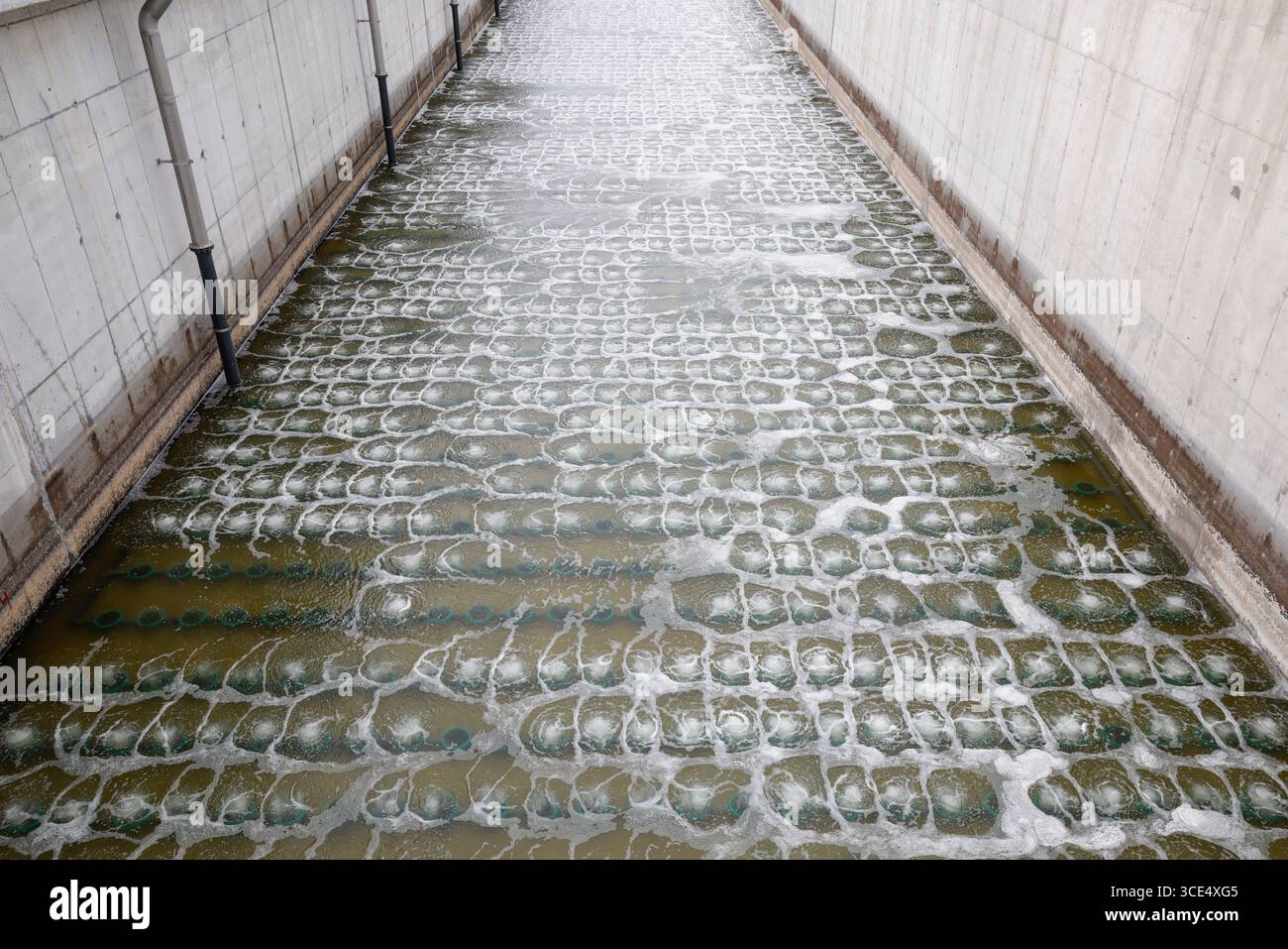 Biological treatment process in aeration basin closeup. Specialized ...