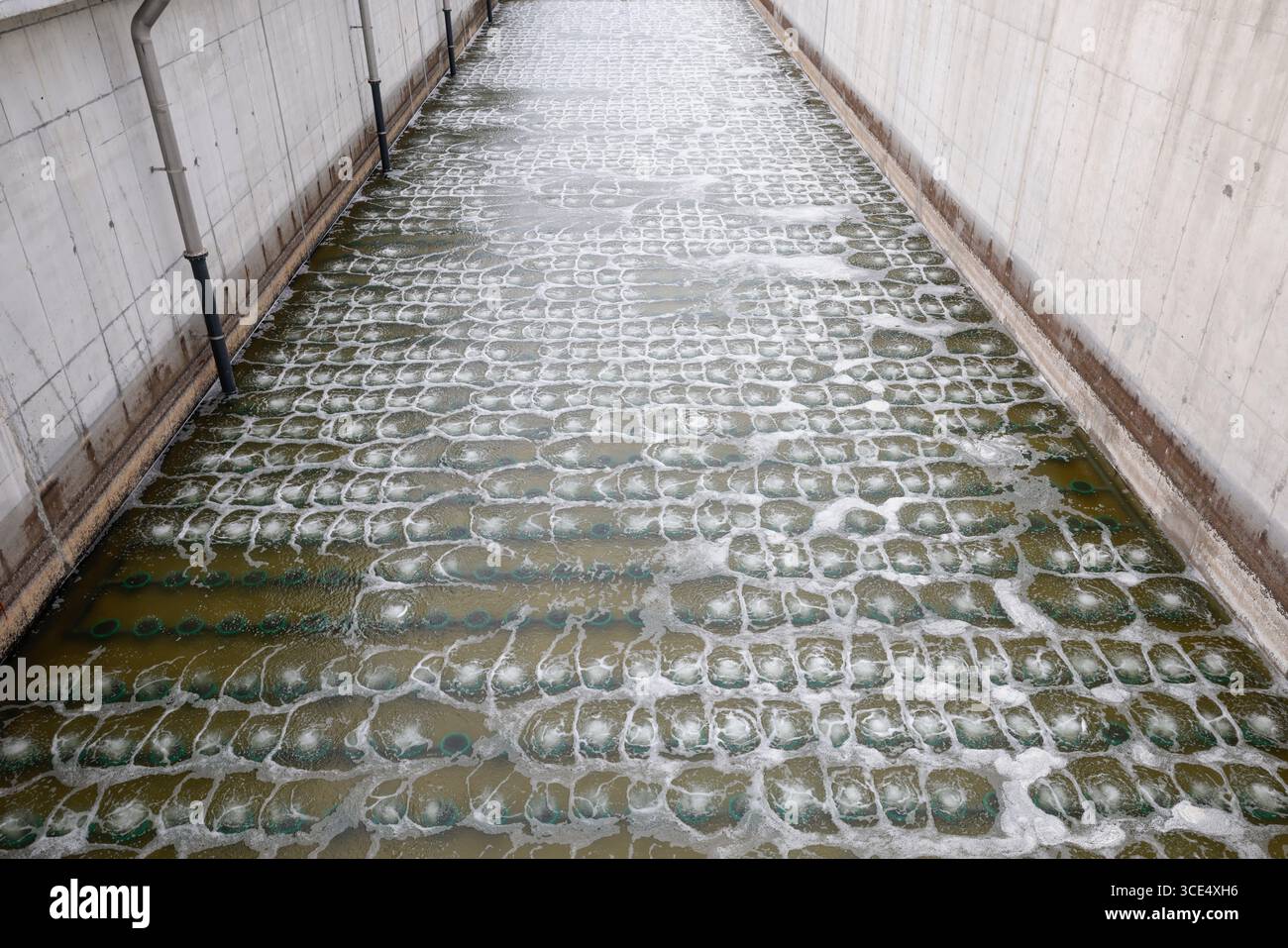 Biological treatment process in aeration basin closeup. Specialized ...