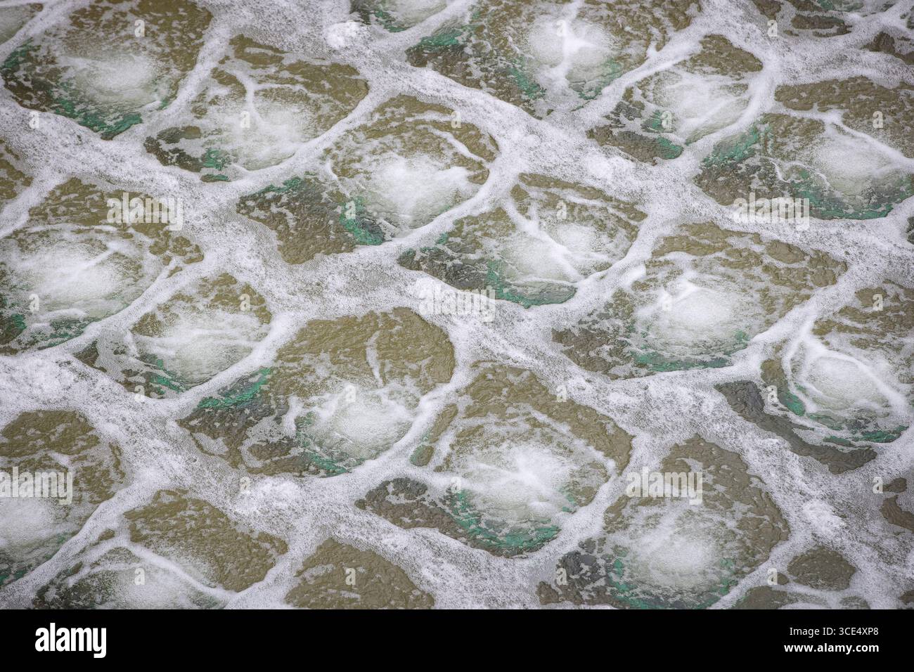Biological treatment process in aeration basin closeup. Specialized ...