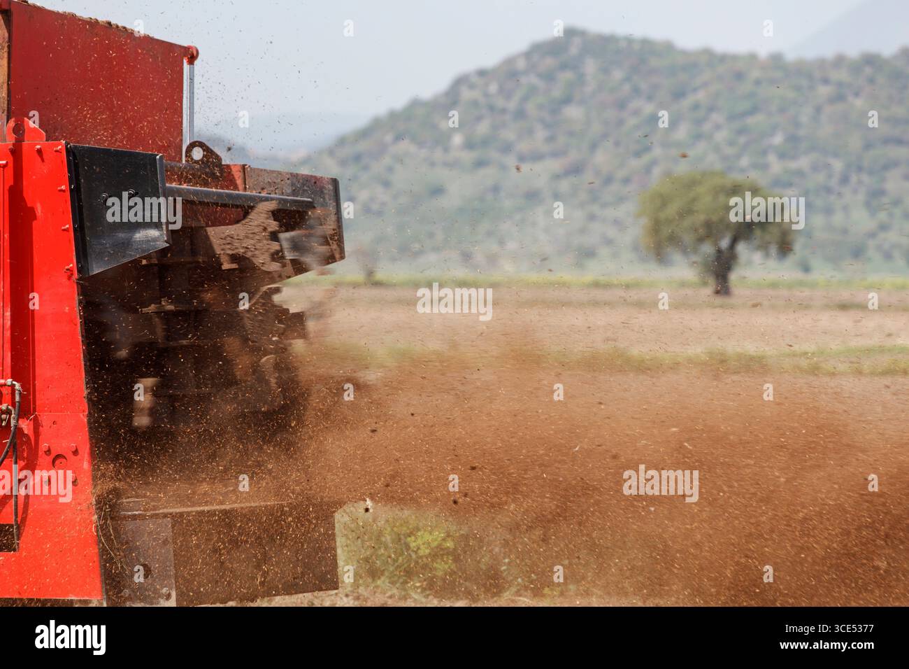 Agricultural scene of farmer manure spreading as agricultural ...