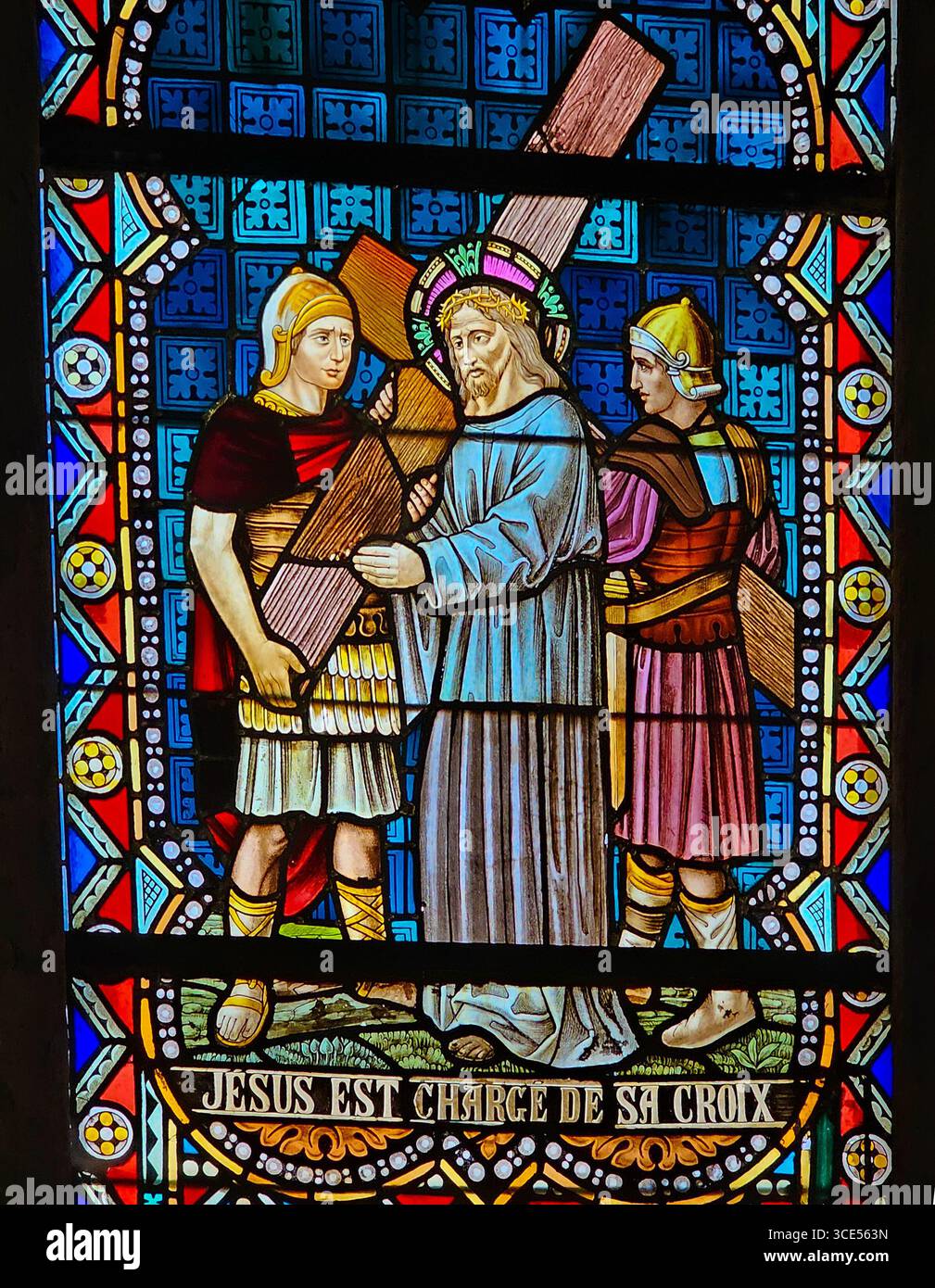 Rochefort, Belgium - July 23, 2025: Stained glass window showing Jesus ...