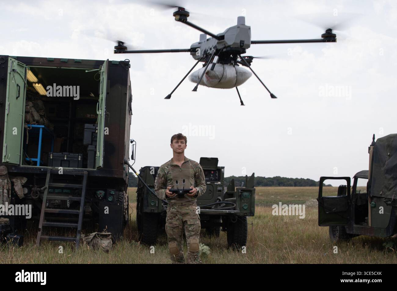 Georgia, USA. 5th Aug, 2025. Army Spc. Max Boatner operates a C100 ...