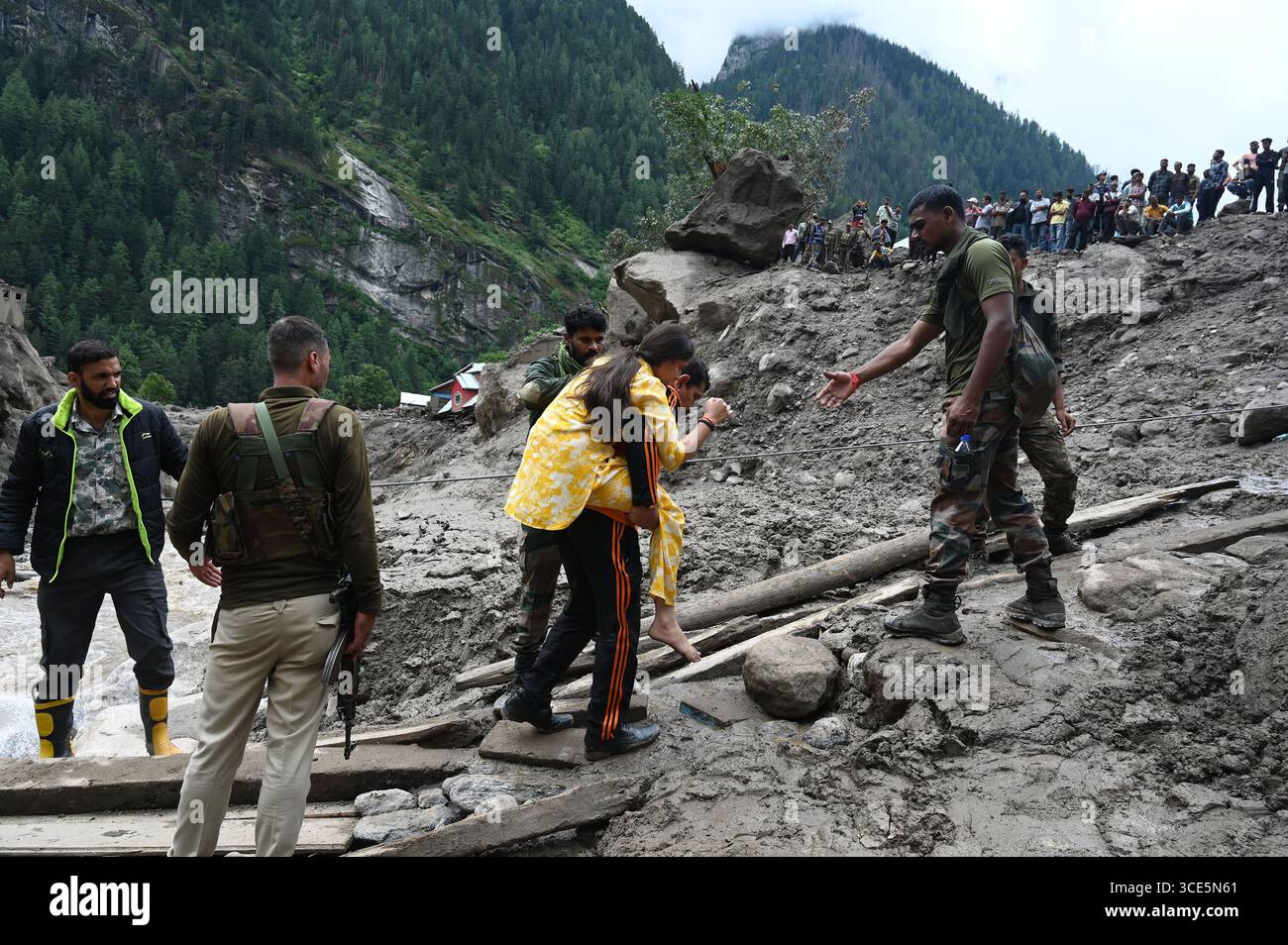 KISHTWAR, INDIA - AUGUST 15: Stranded pilgrims being rescued, the day after flash floods at ...