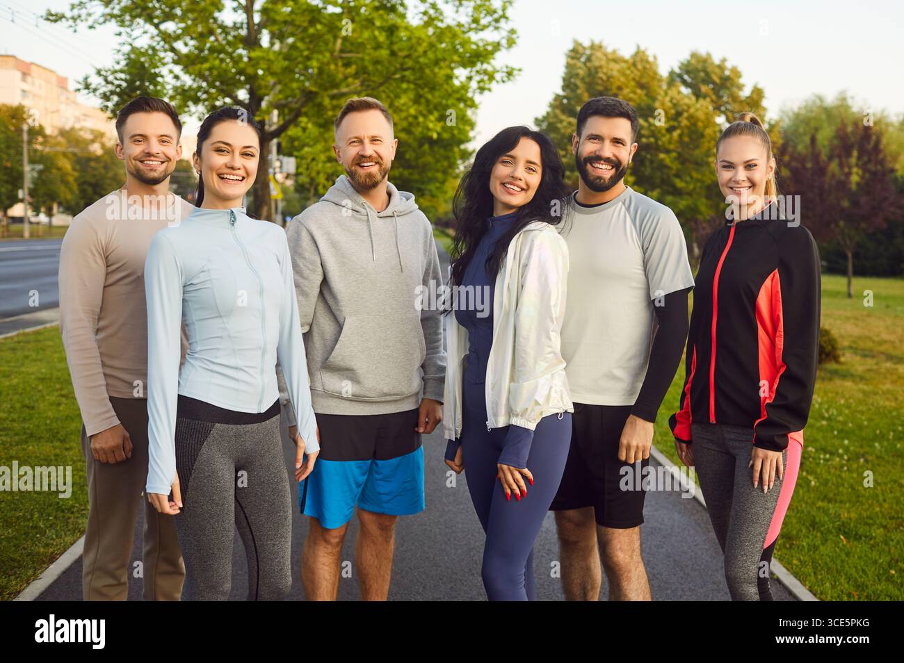 Morning run of friends team, happy runners before start of jogging ...