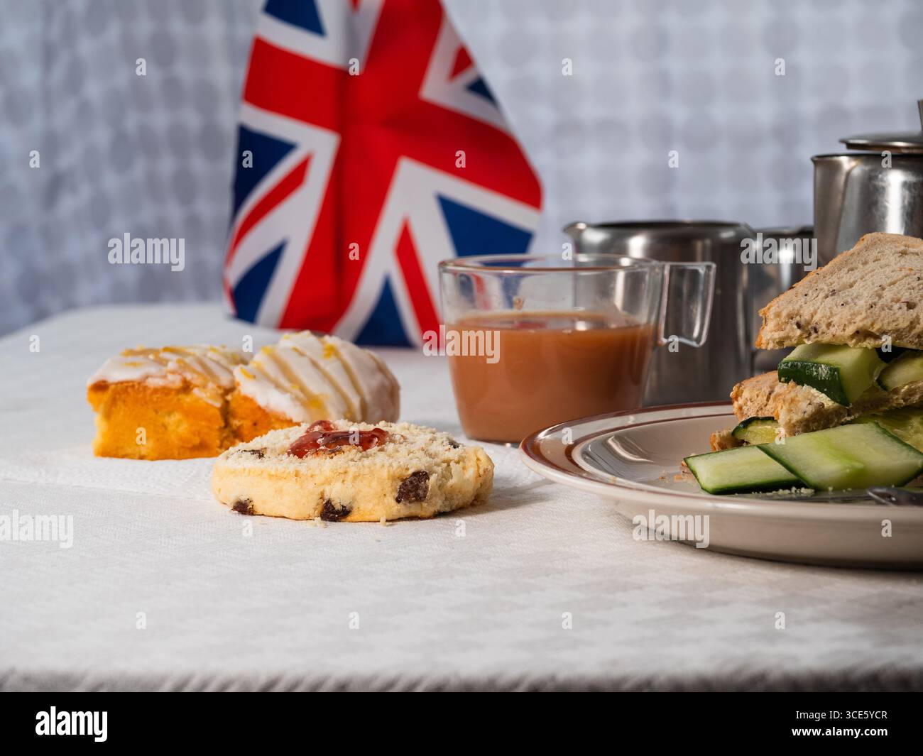 Traditional English tea with jam scone and cucumber sandwiches Stock ...