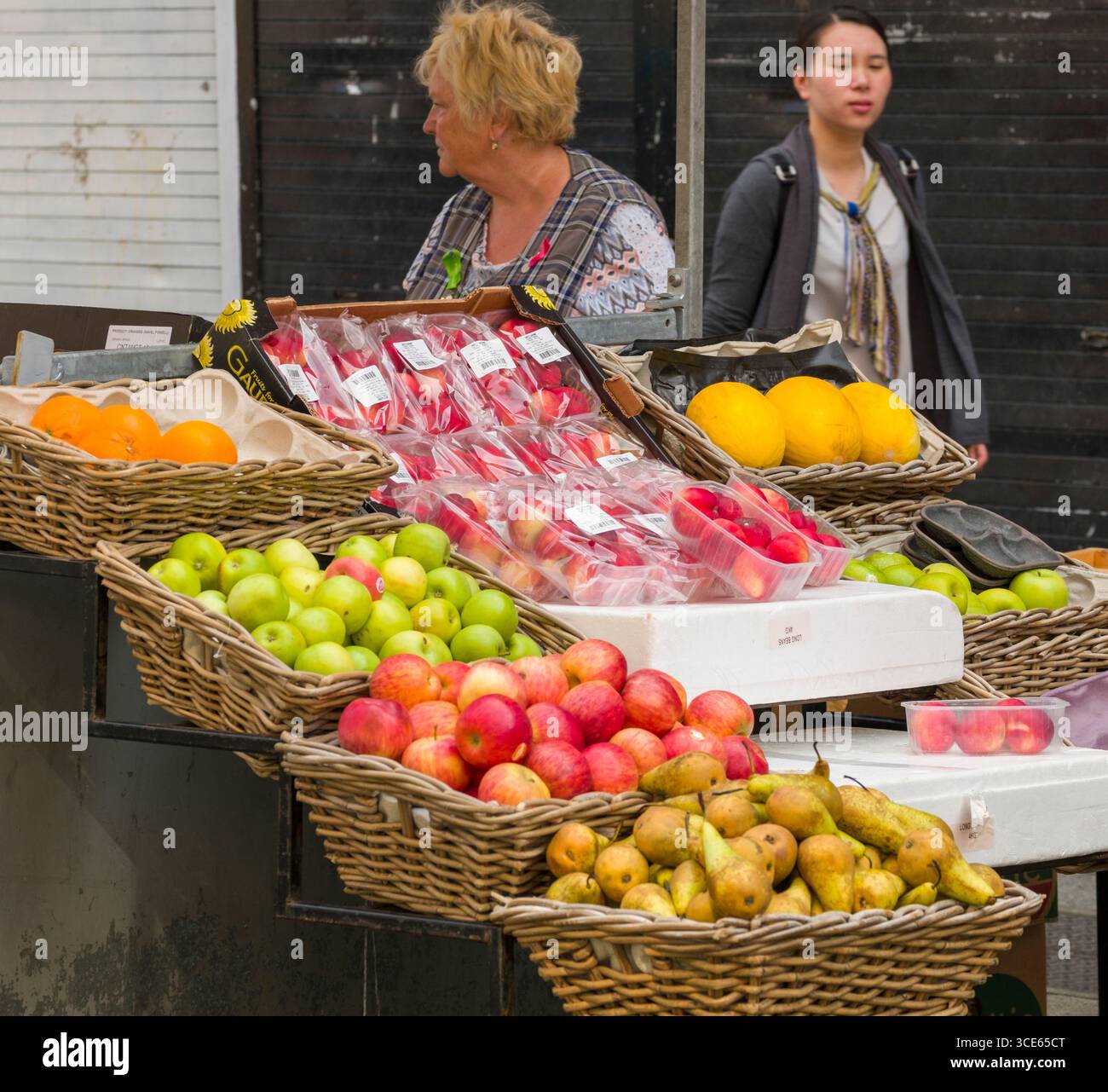Fresh fruits in wicker baskets for sale at the Moore Street open-air ...