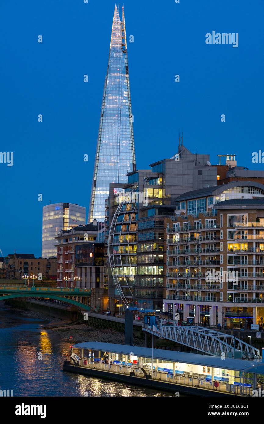 The Shard, a spire-like supertall skyscraper at sunset, Southwark ...
