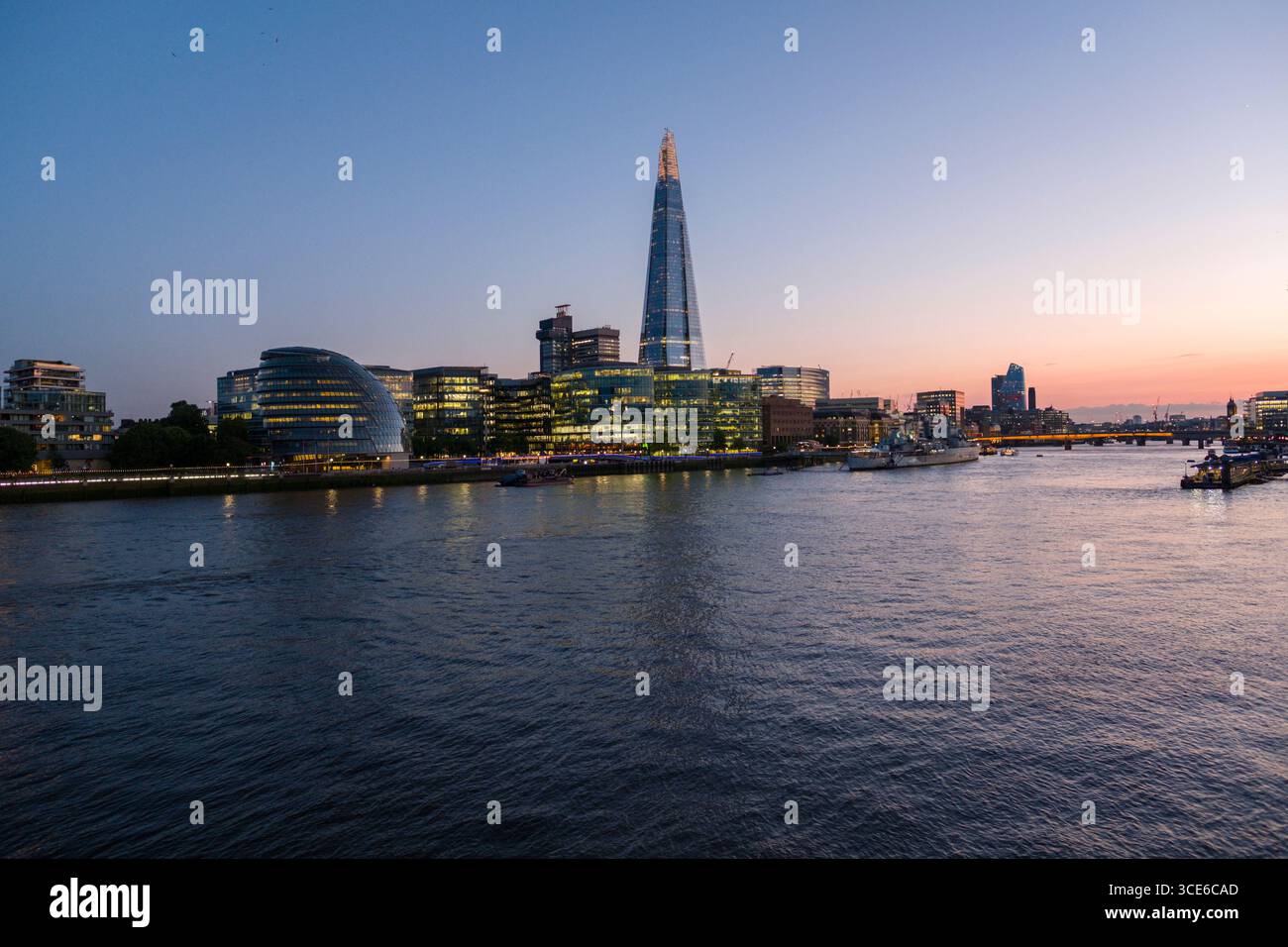 The Shard, a spire-like supertall skyscraper at sunset, Southwark ...